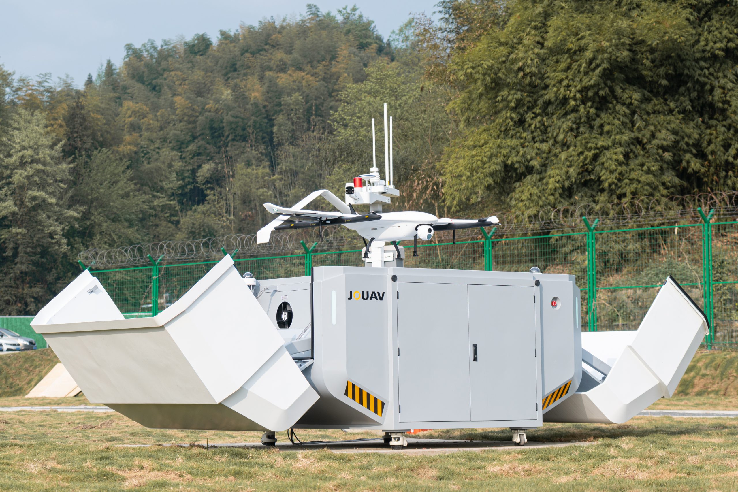 JOUAV Unveils Next-Gen VTOL Hangar for Automated Power Line Inspection - JOUAV